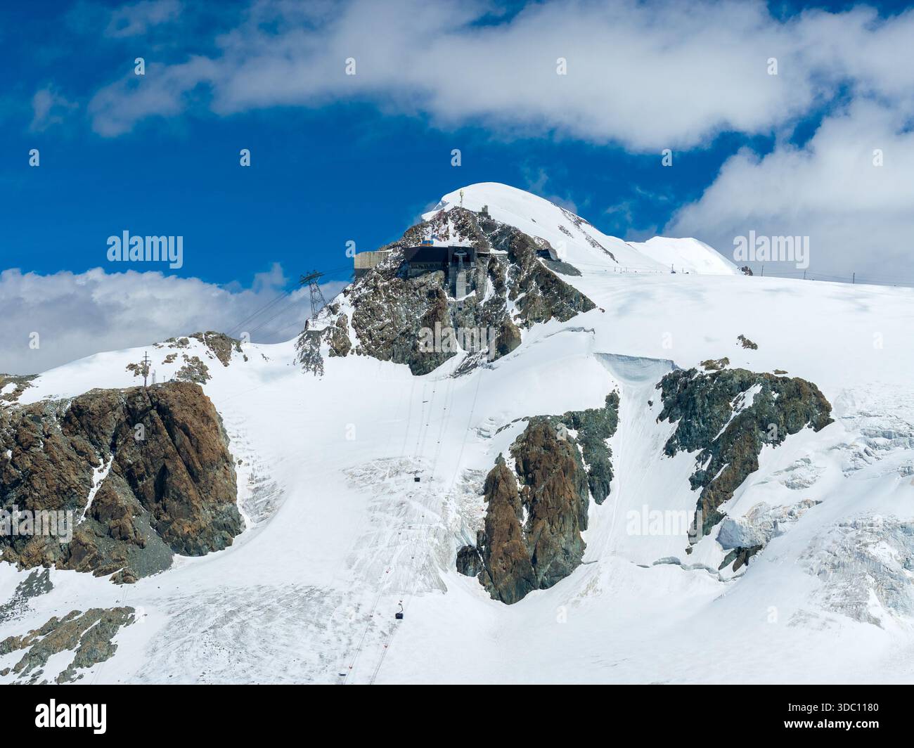 Snow-covered Testa Grigia peak near the Matterhorn, showing the Plateau ...