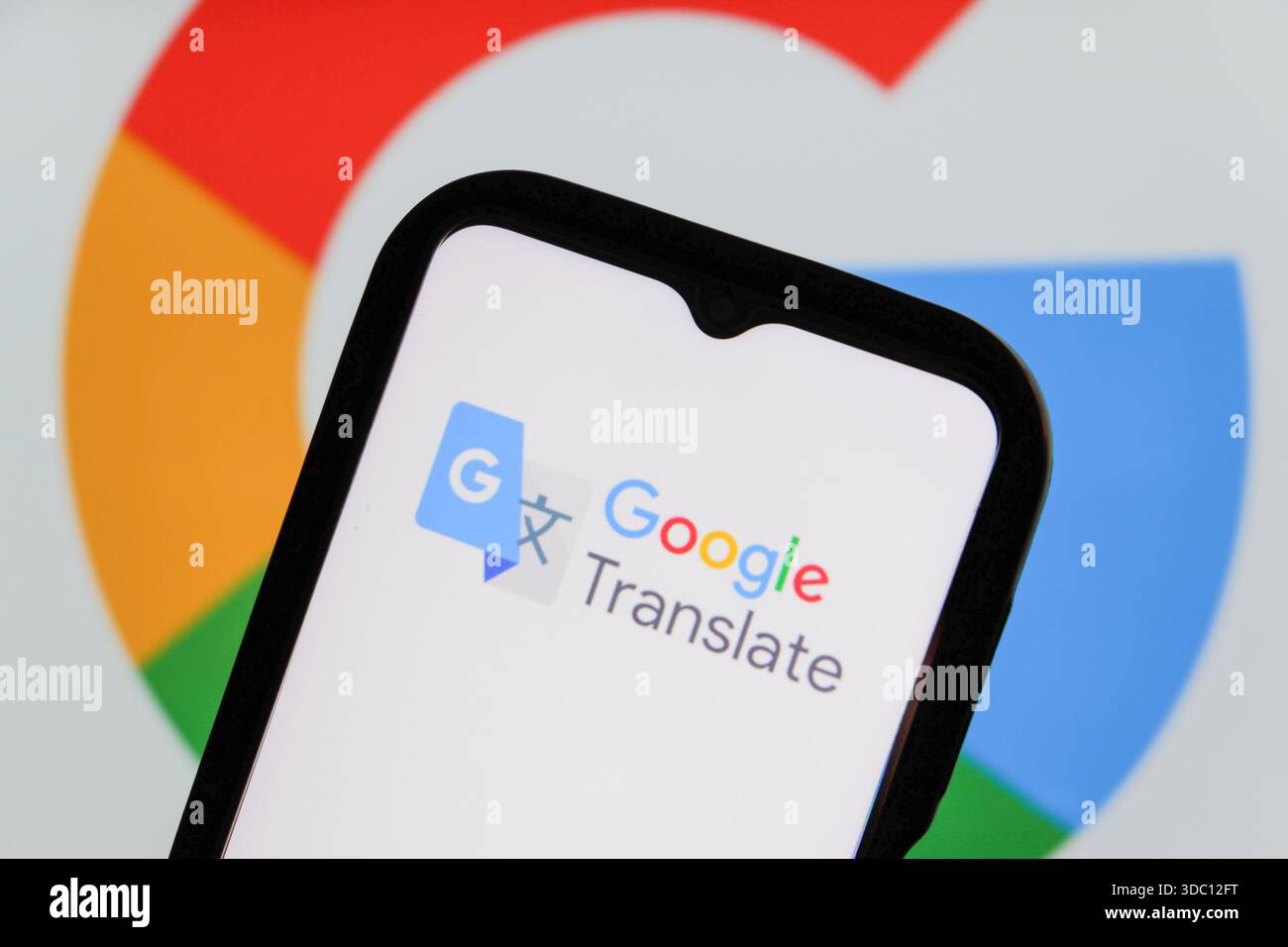 In this photo illustration, the Google Translate logo is seen displayed ...