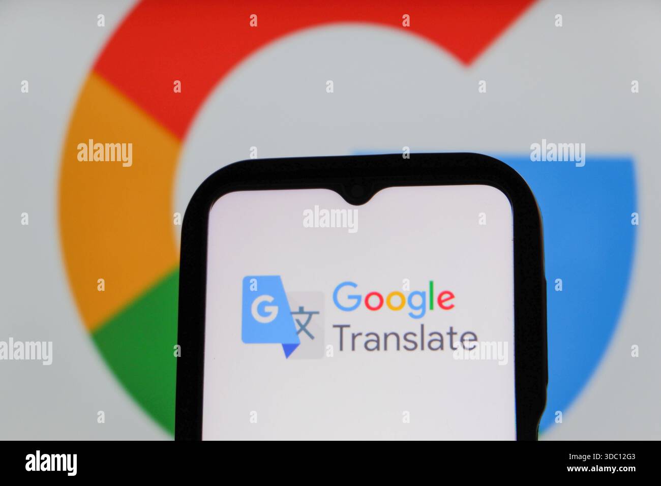 In this photo illustration, the Google Translate logo is seen displayed ...
