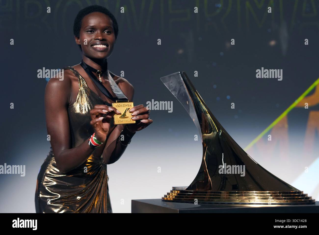Doris Lemngole of Alabama poses with the Bowerman Award trophy at the ...