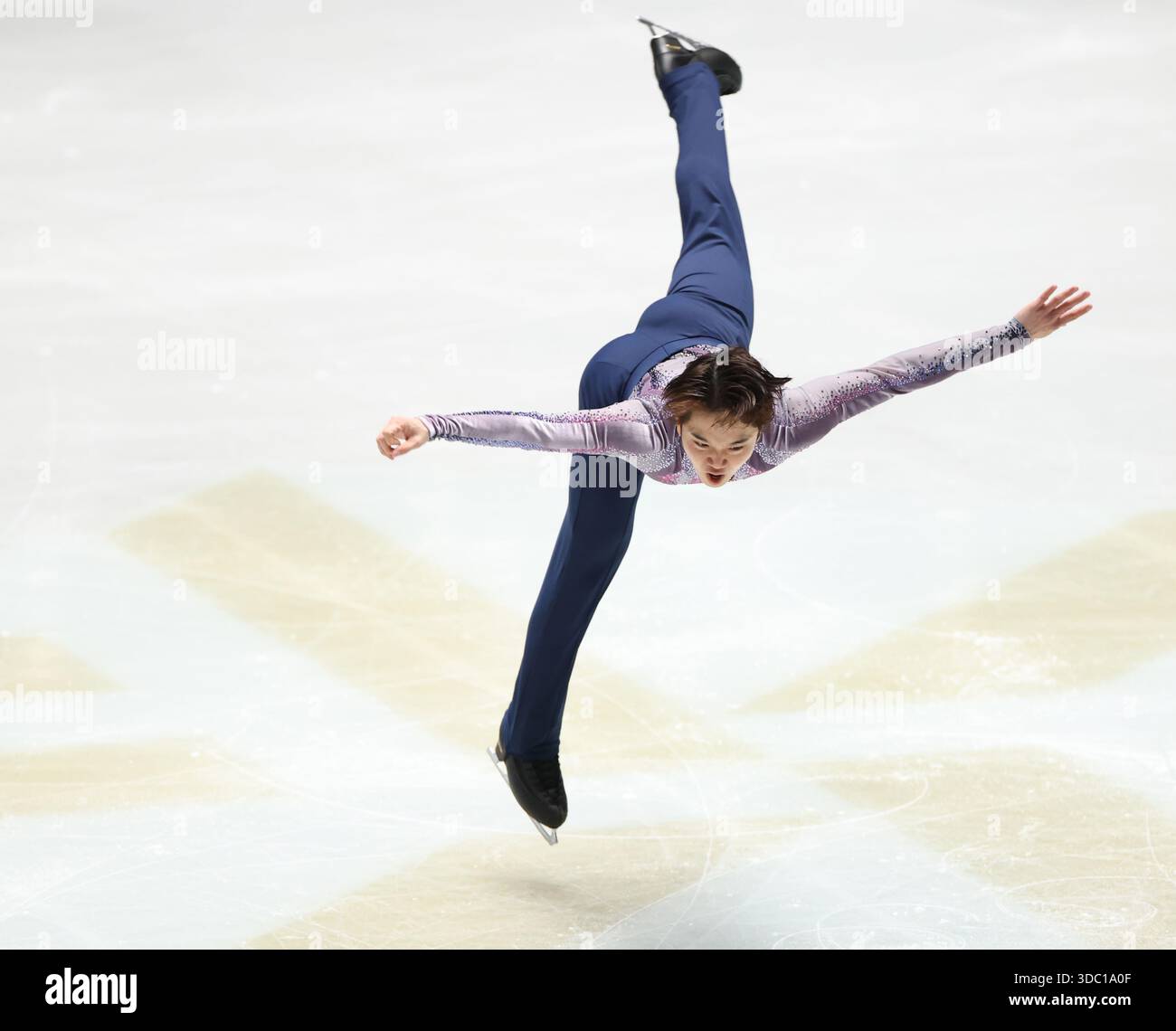 Kazuki TOMONO performs during the men's short program at the Japan ...