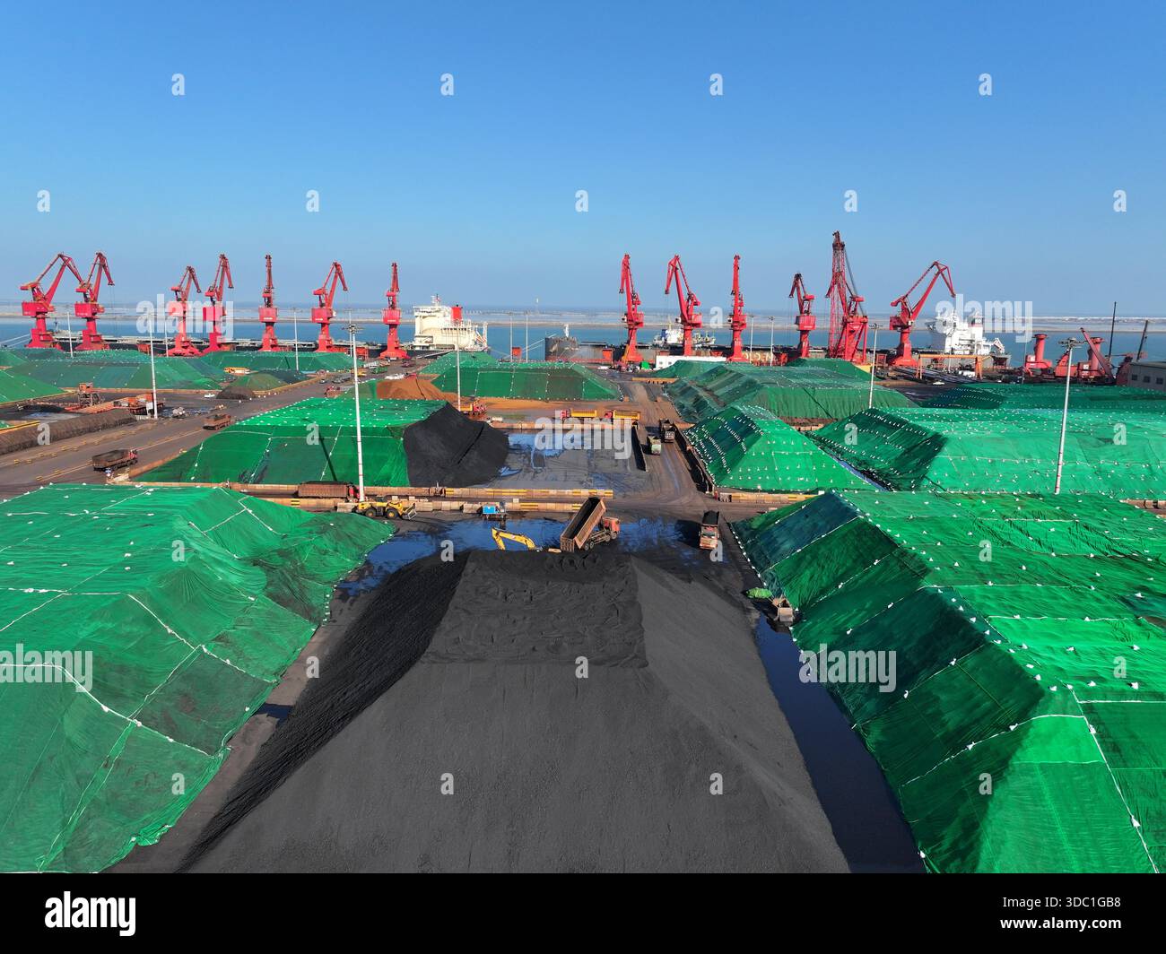 Aerial photo shows the ship unloading coals at Lianyungang Port in ...