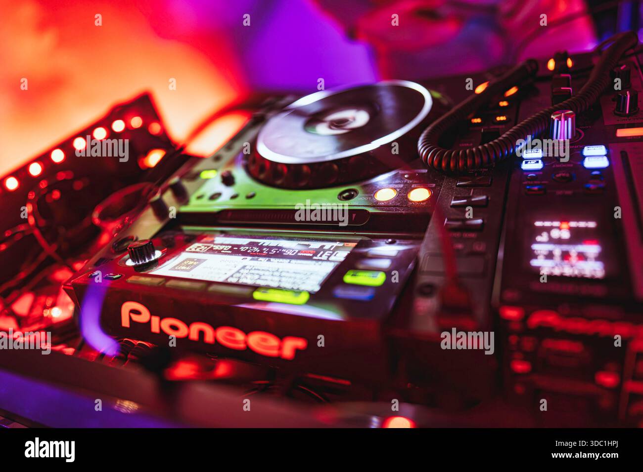 Rovigo, italy 18 december 2025: dj equipment with glowing lights ...