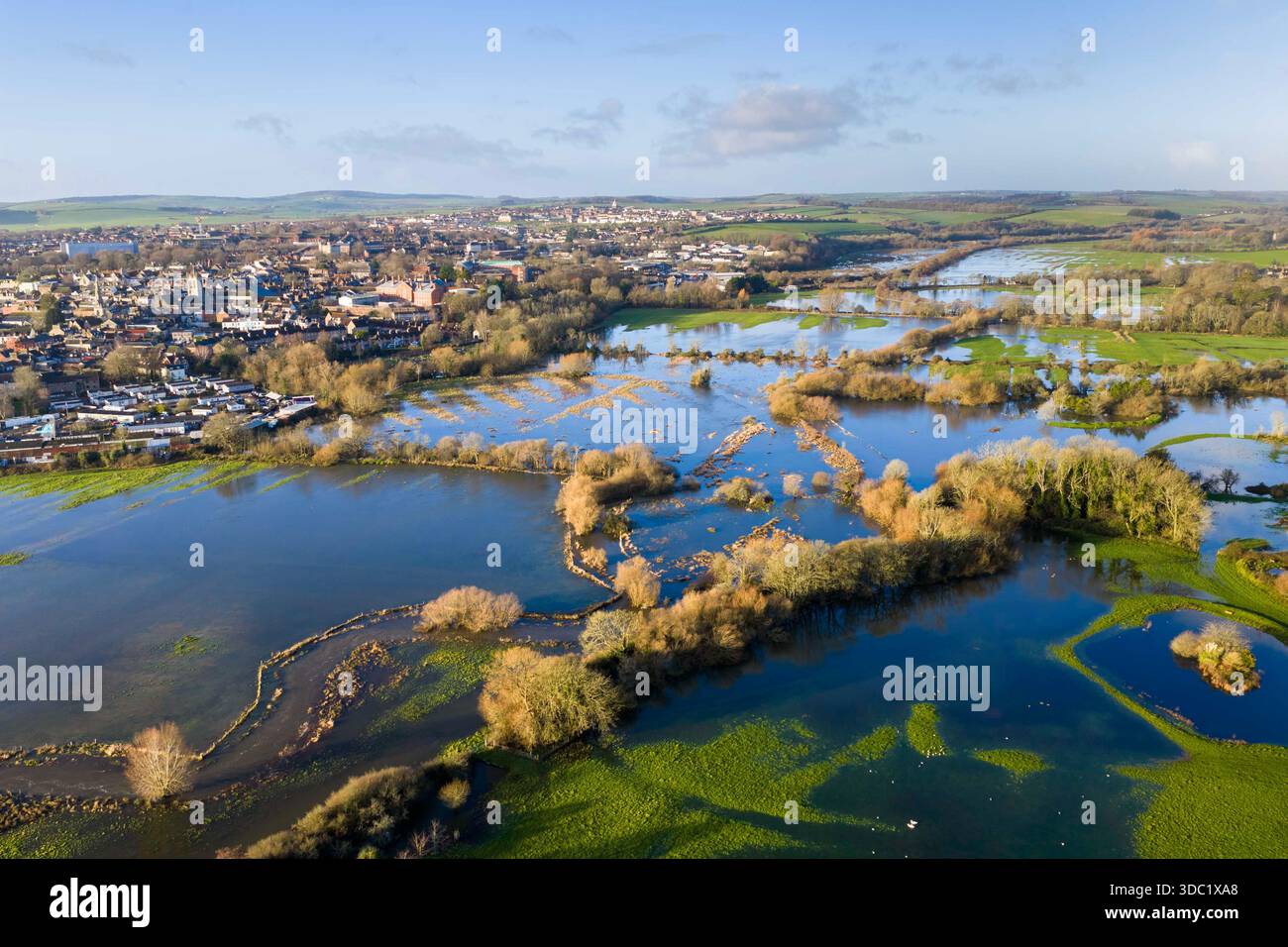 Aerial view of the River Frome at Dorchester in Dorset which has burst ...