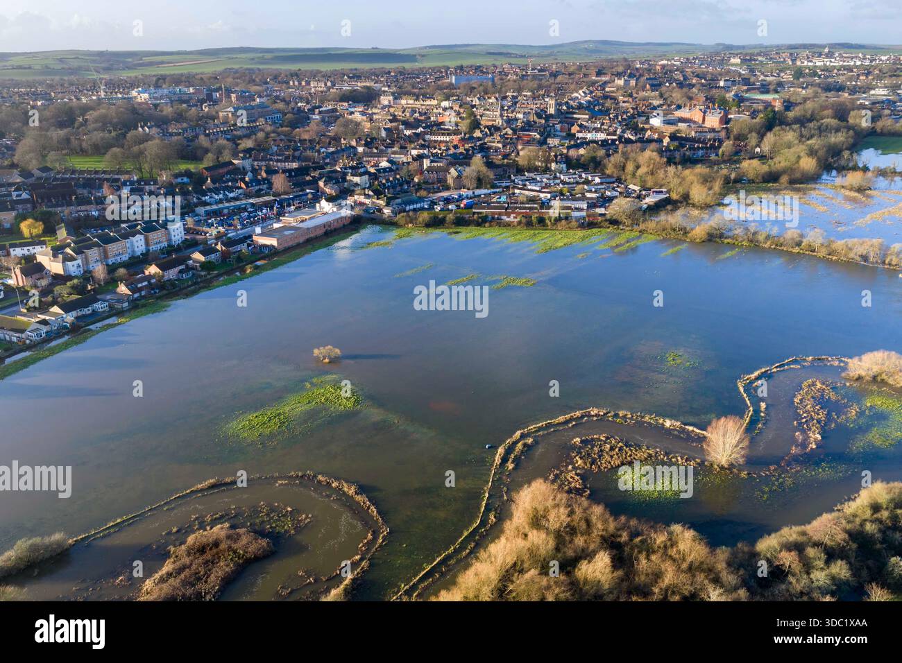 Aerial view of the River Frome at Dorchester in Dorset which has burst ...