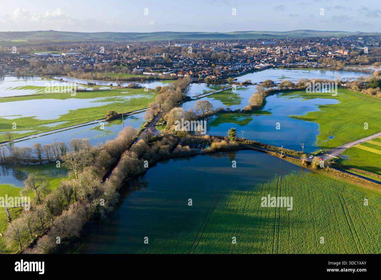 Aerial view of the River Frome at Dorchester in Dorset which has burst ...