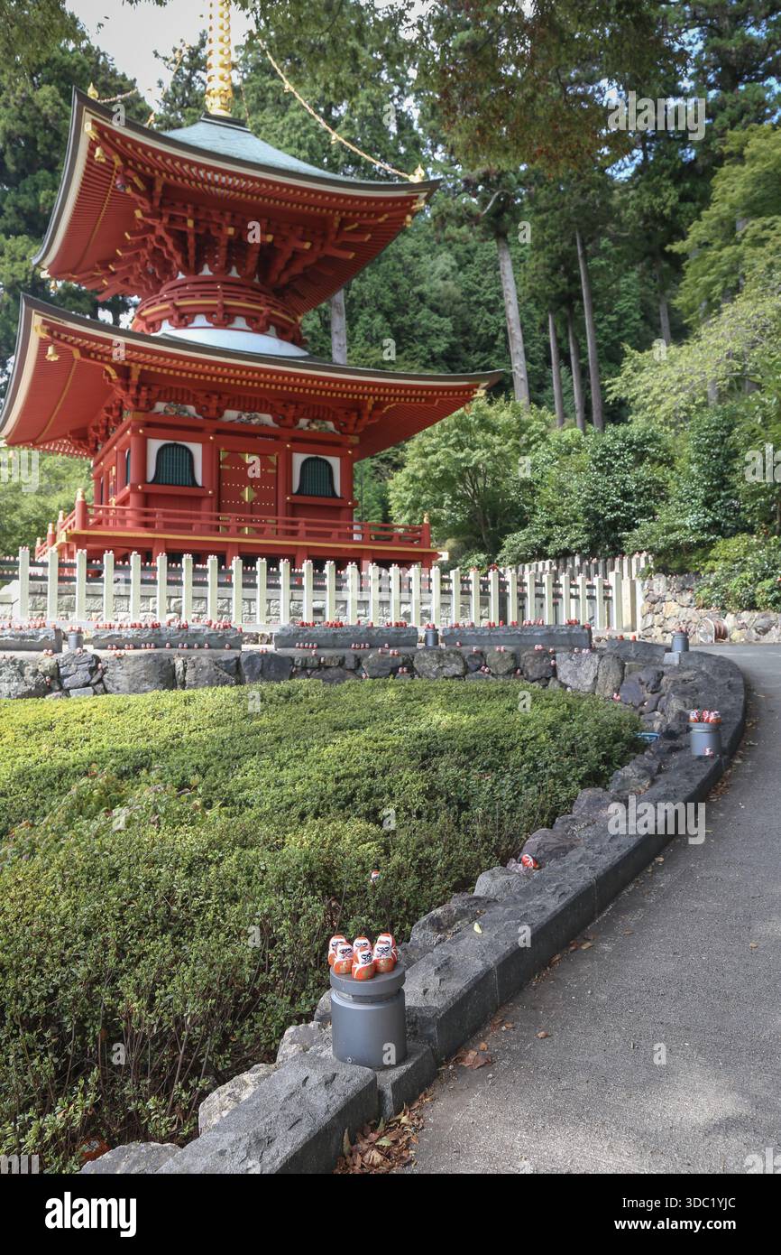 Daruma dolls scattered everywhere around japanese temple Stock Photo ...