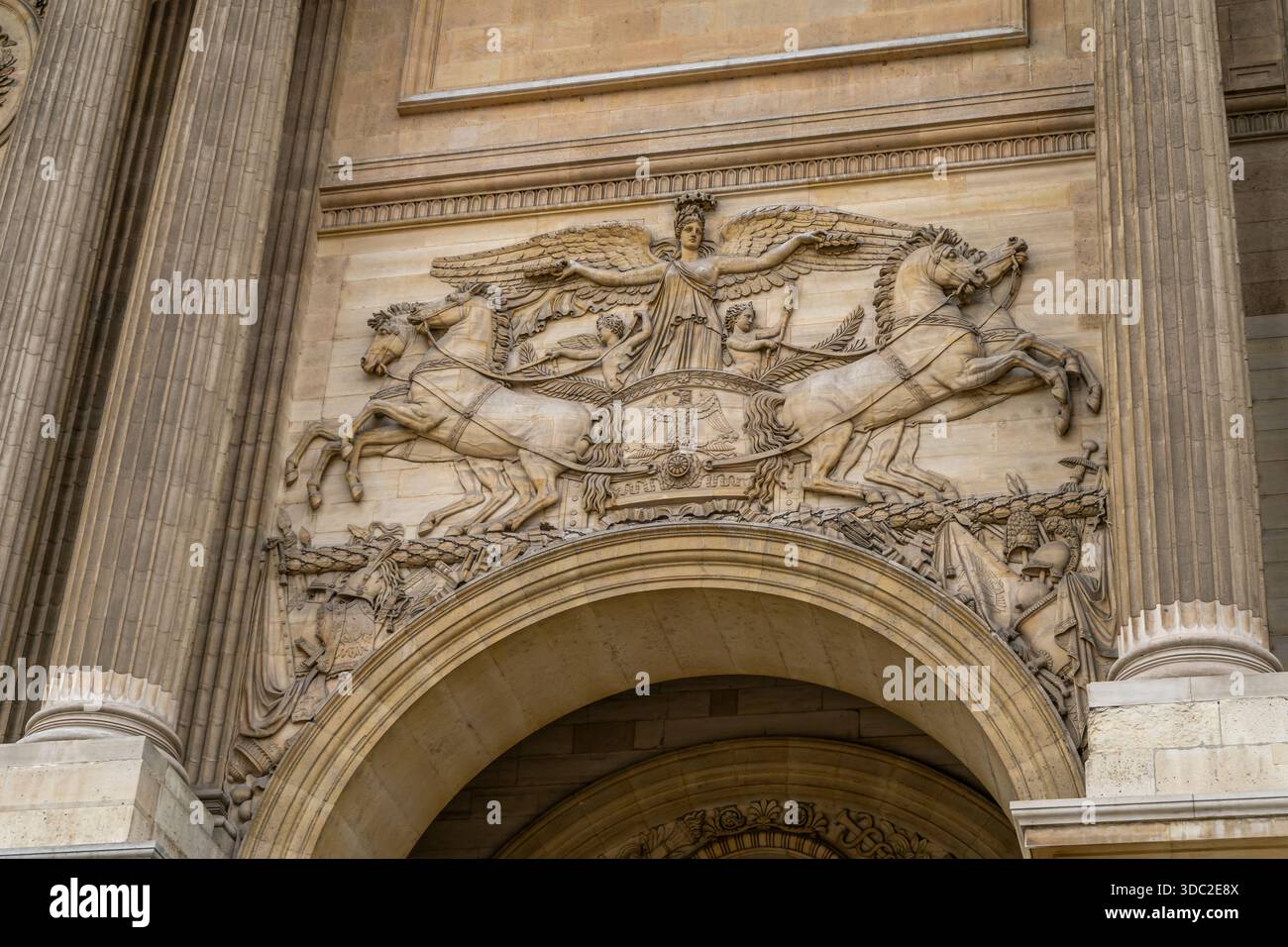 Horses on old wall facade house building in Paris Louvre museum ...
