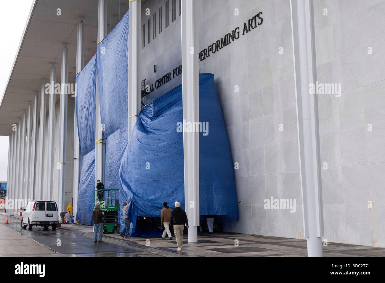 Tarps are installed in front of the sign on the Kennedy Center on ...