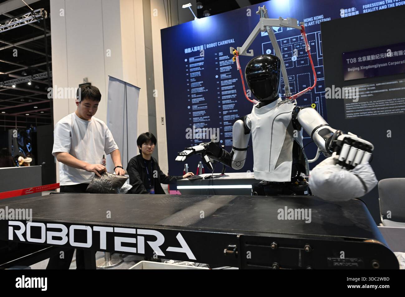 A robot distribute express packages at the Hong Kong AI Art Festival on ...