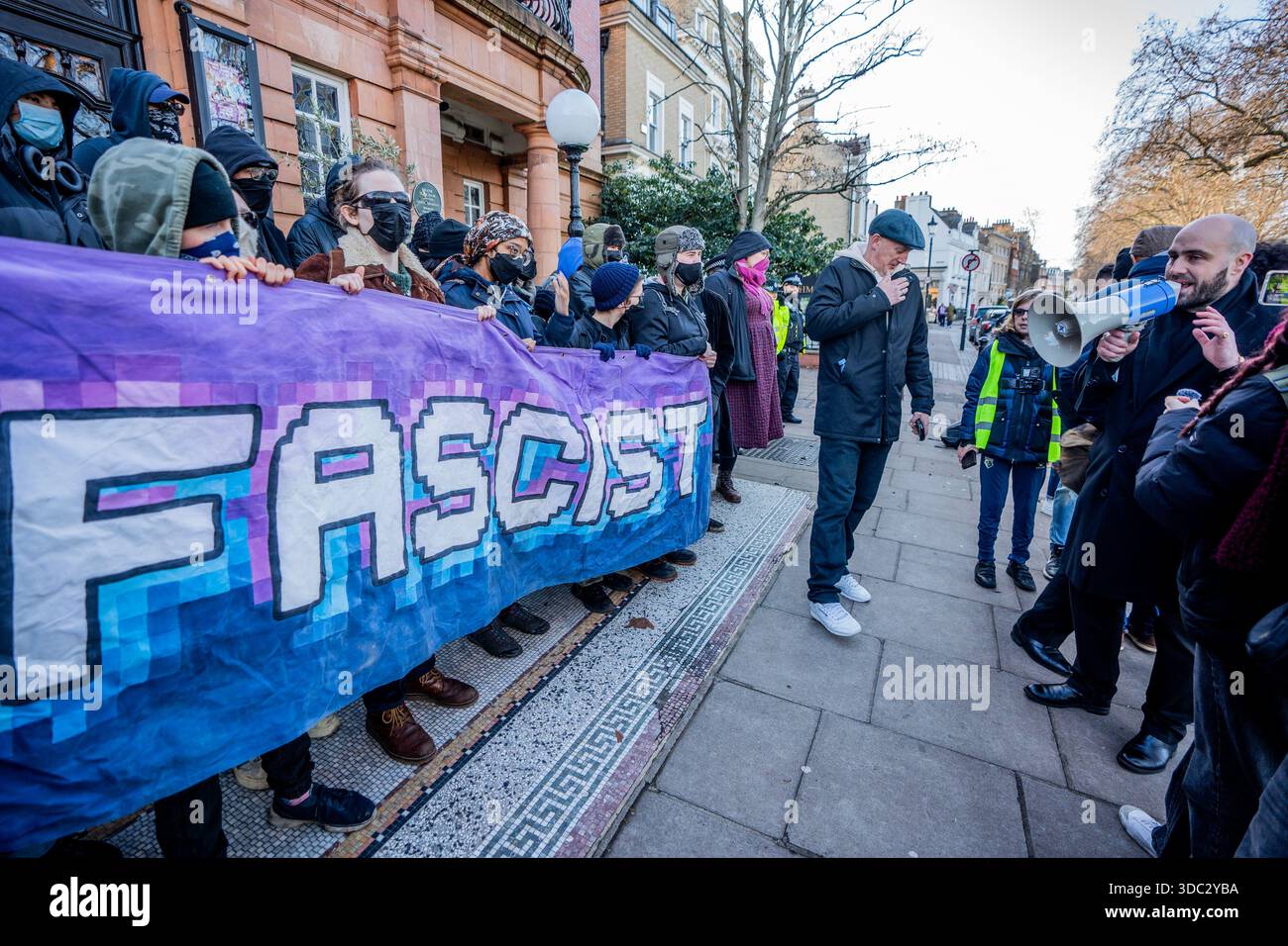 Leader of the UKIP Party Nick Tenconi chants slogans on a megaphone ...