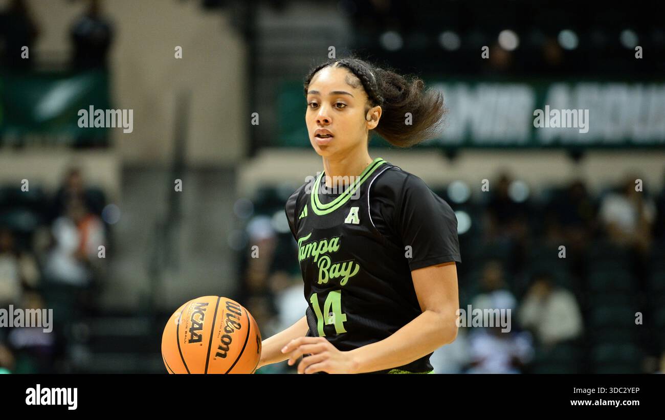 University of South Florida's Ines Piper (14) drives to the hoop during ...