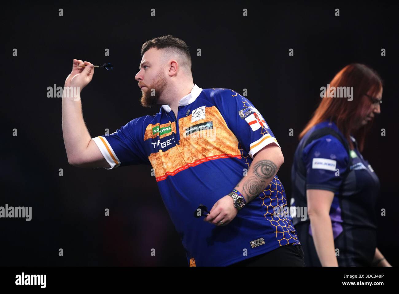 Northern Ireland's Josh Rock in action against England's Gemma Hayter ...