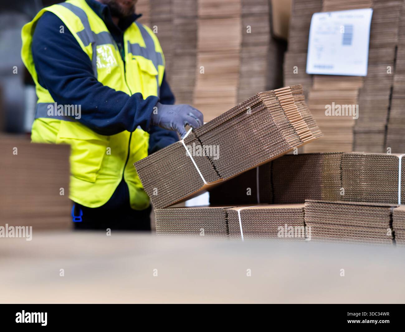 Stock of packaging cardboard in a warehouse Stock Photo - Alamy