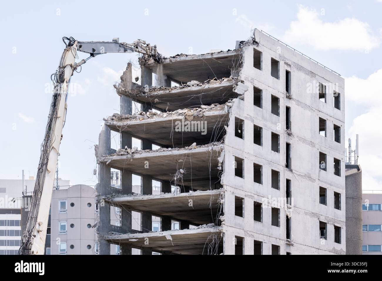 A construction site of deconstruction of concrete building /a concrete ...