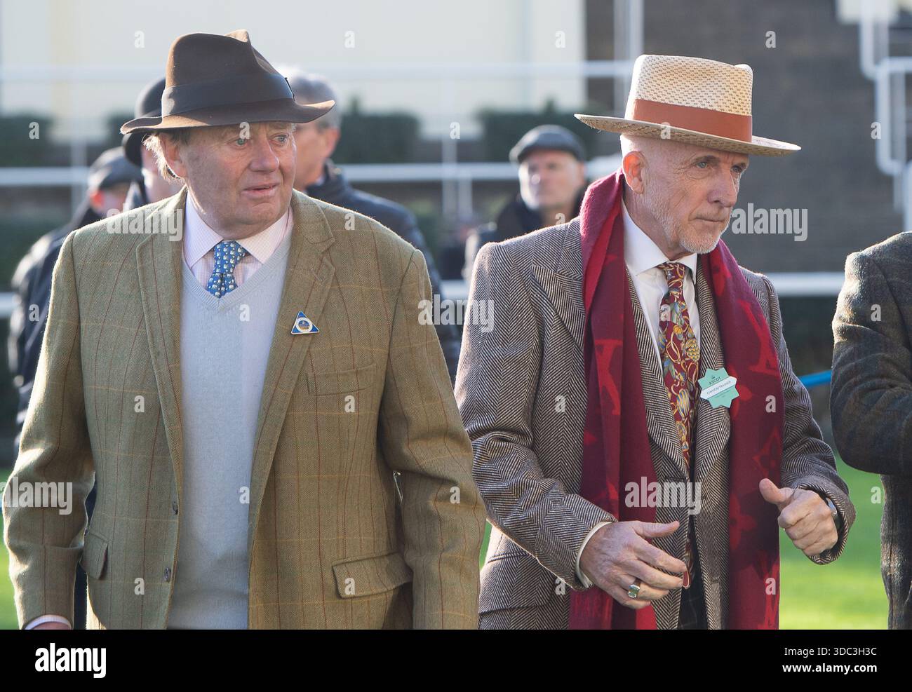 Ascot, Berkshire, UK. 19th December, 2025. Trainer Nicky Henderson (L ...