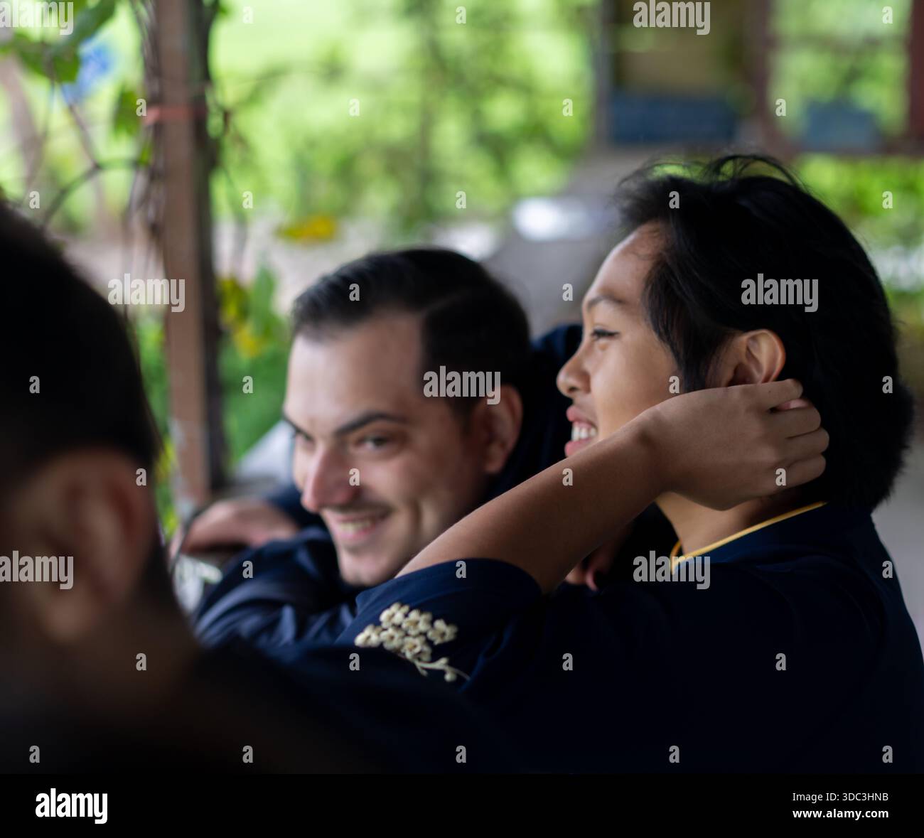 Couple cuddling cafe high hi-res stock photography and images - Alamy