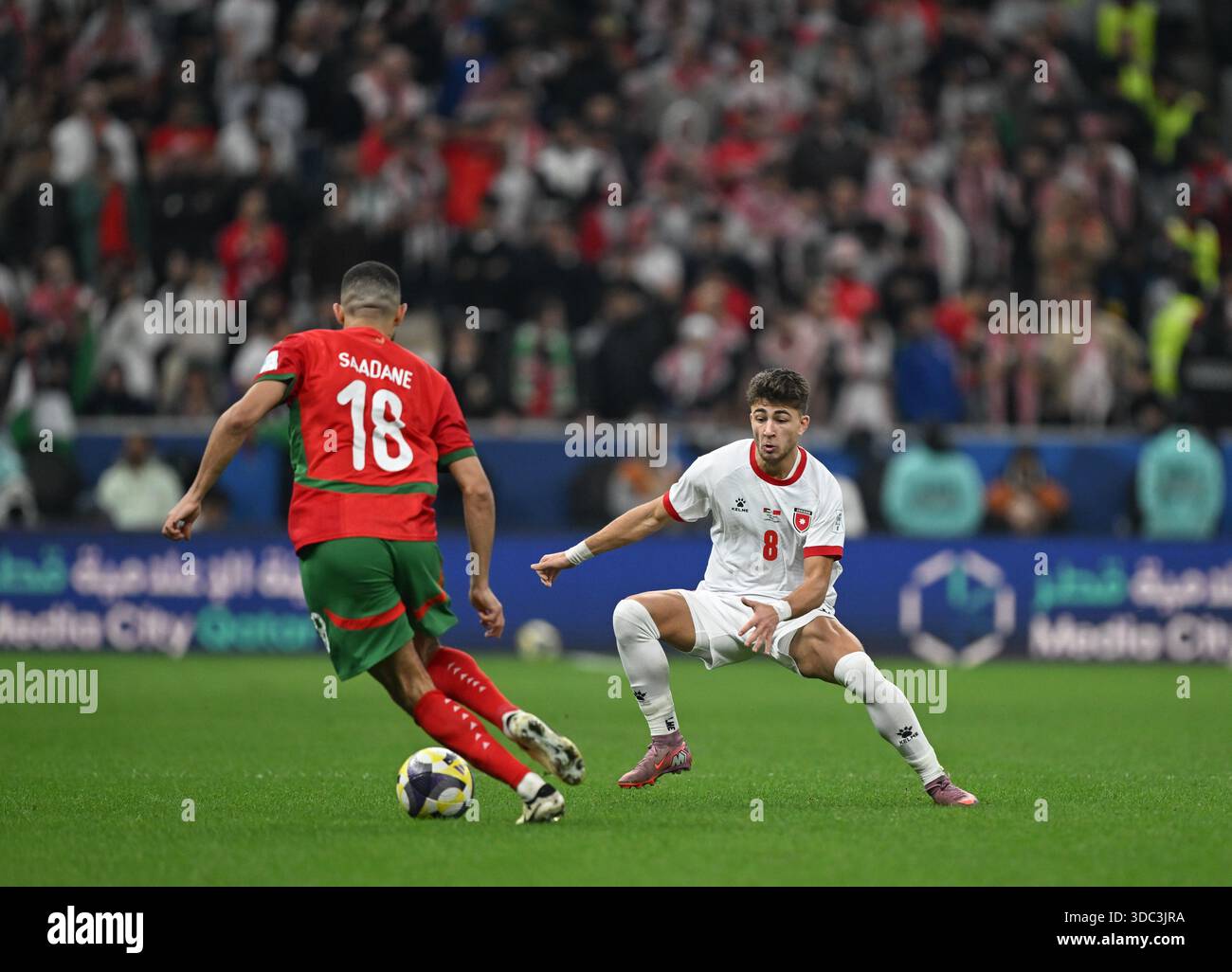 Doha, Qatar. December 18 2025: Morocco and Jordan football players on ...