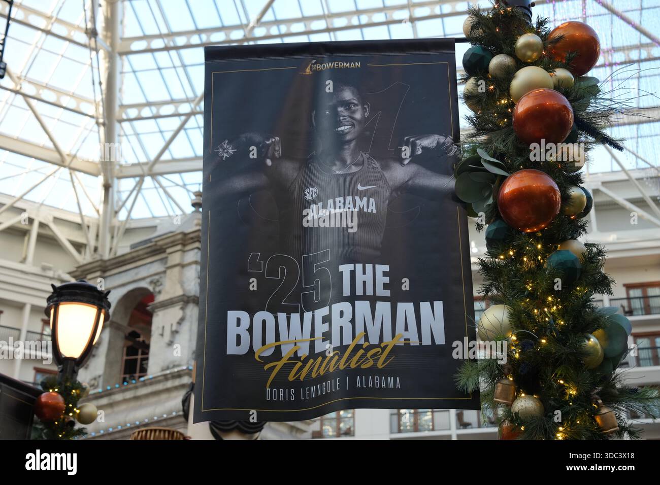 A banner featuring Bowerman Award winner Doris Lemngole at the USTFCCAA ...