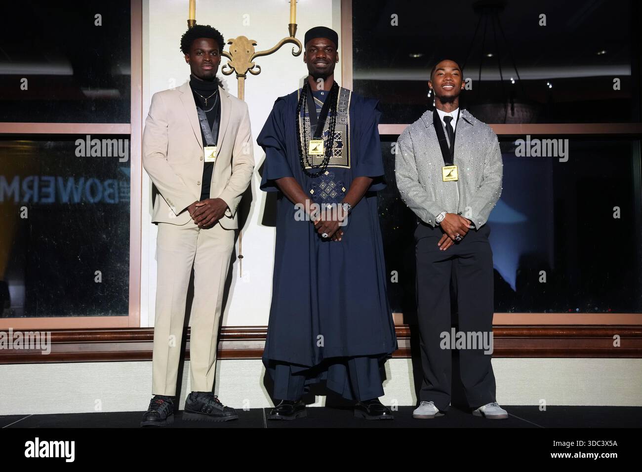 Bowerman Award finalists Ja'Kobe Tharp of Auburn (center), Nathaniel ...