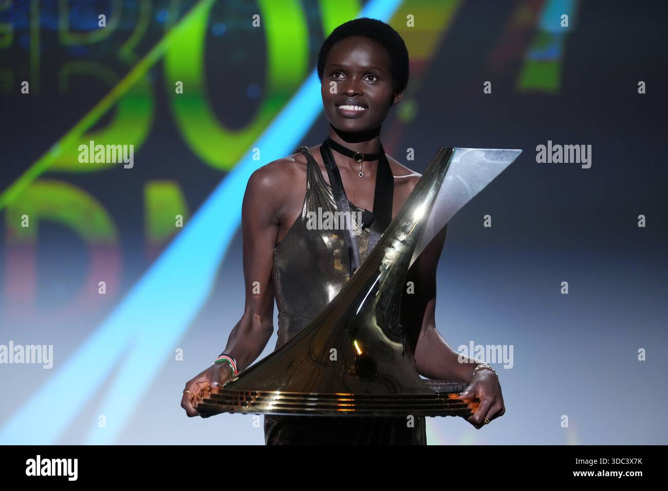 Doris Lemngole of Alabama poses with the Bowerman Award trophy at the ...