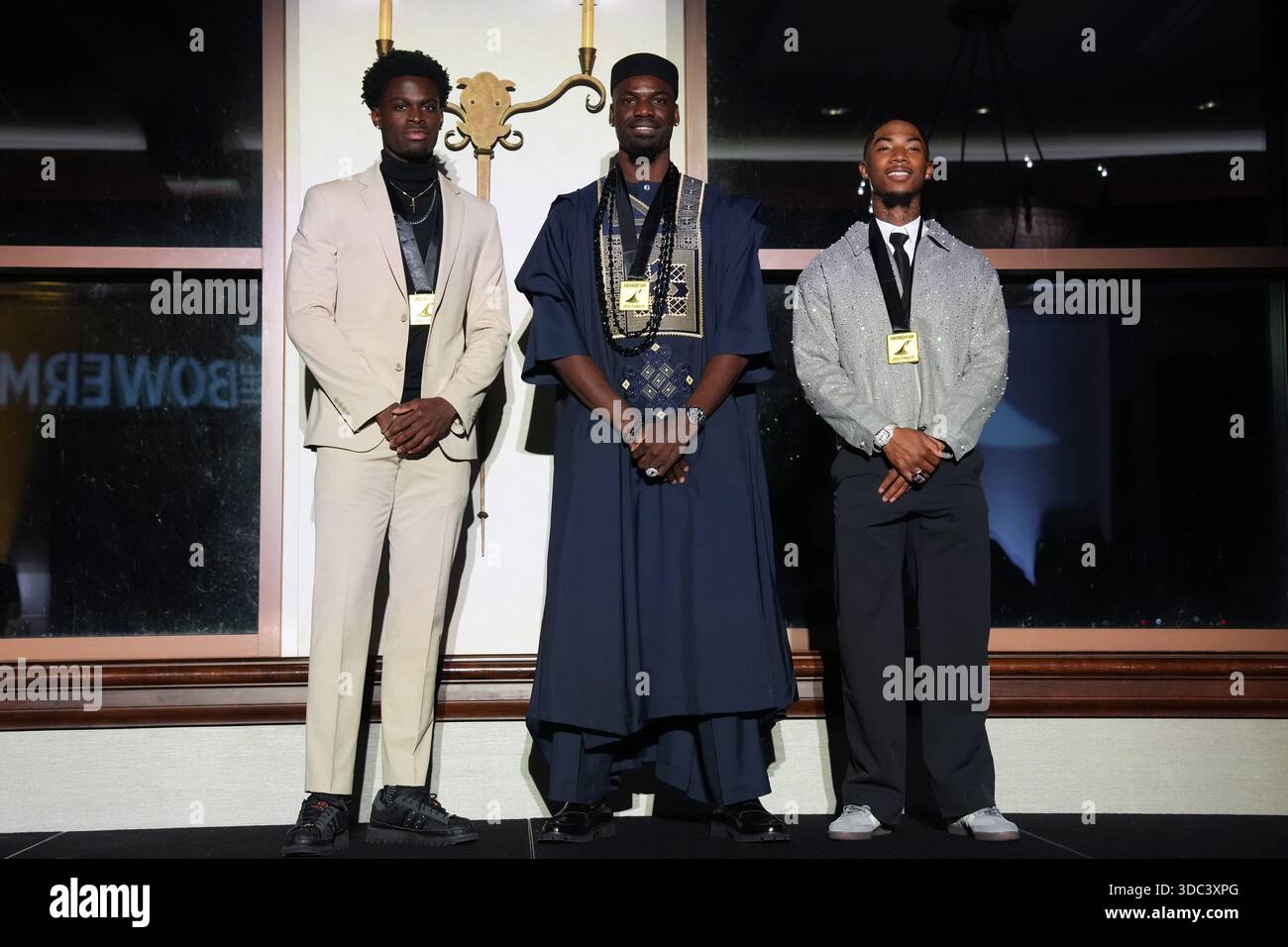 Bowerman Award finalists Ja'Kobe Tharp of Auburn (center), Nathaniel ...