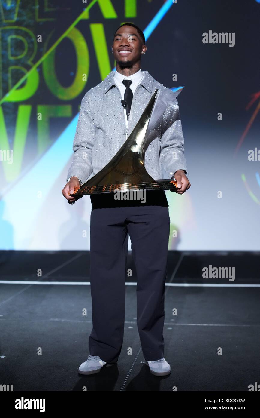 Jordan Anthony of Arkansas poses with the Bowerman Award trophy at the ...