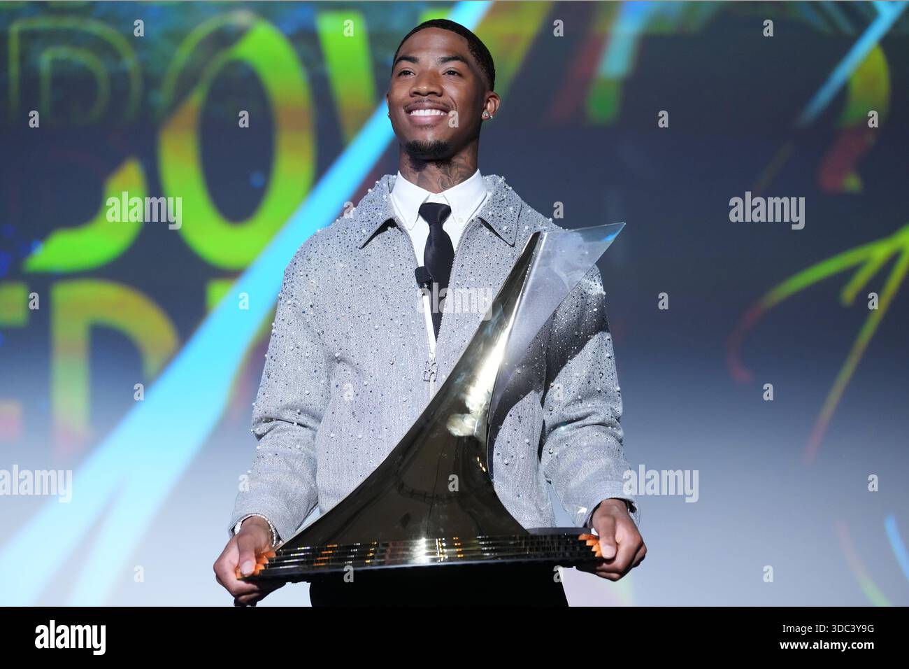 Jordan Anthony of Arkansas poses with the Bowerman Award trophy at the ...