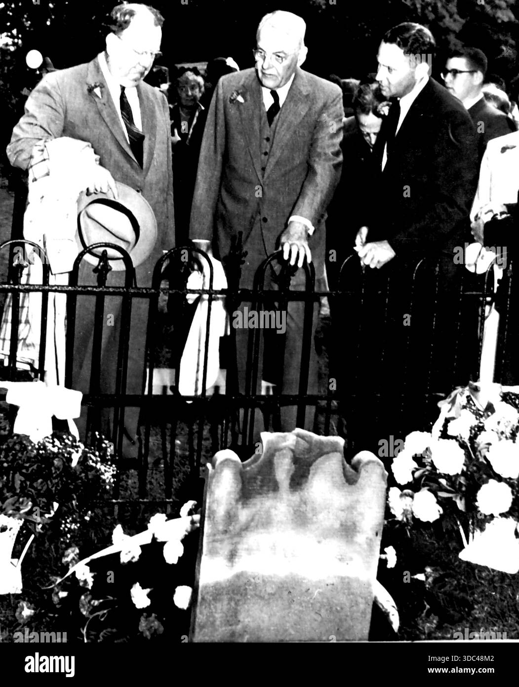 John Foster Dulles, Center, today paid homage at the graves of his ...