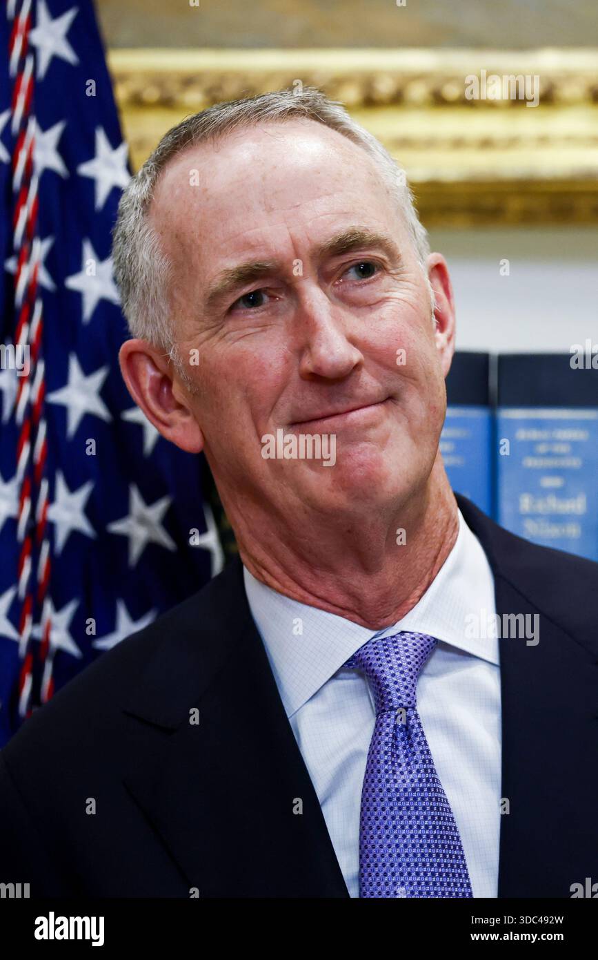 Gilead Sciences CEO Daniel O’Day looks on as US President Donald Trump ...