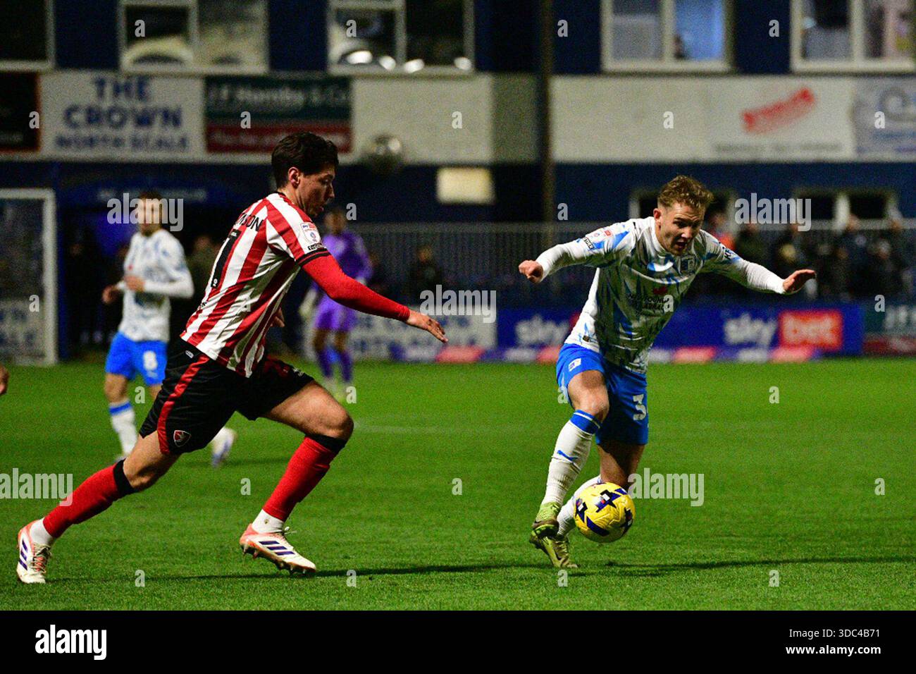 Barrow's Ben Whitfield attacks the Cheltenham Town defence during the ...