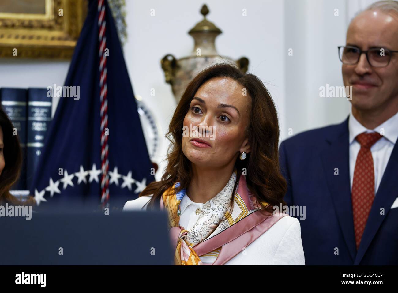 Bristol Myers Squibb Executive Vice President Cari Gallman looks on as ...