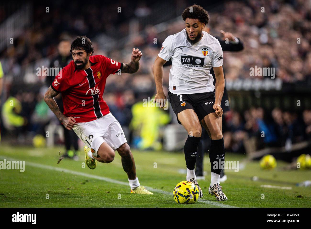 Samu COSTA of RCD Mallorca and Arnault DANJUMA of FC Valencia during ...