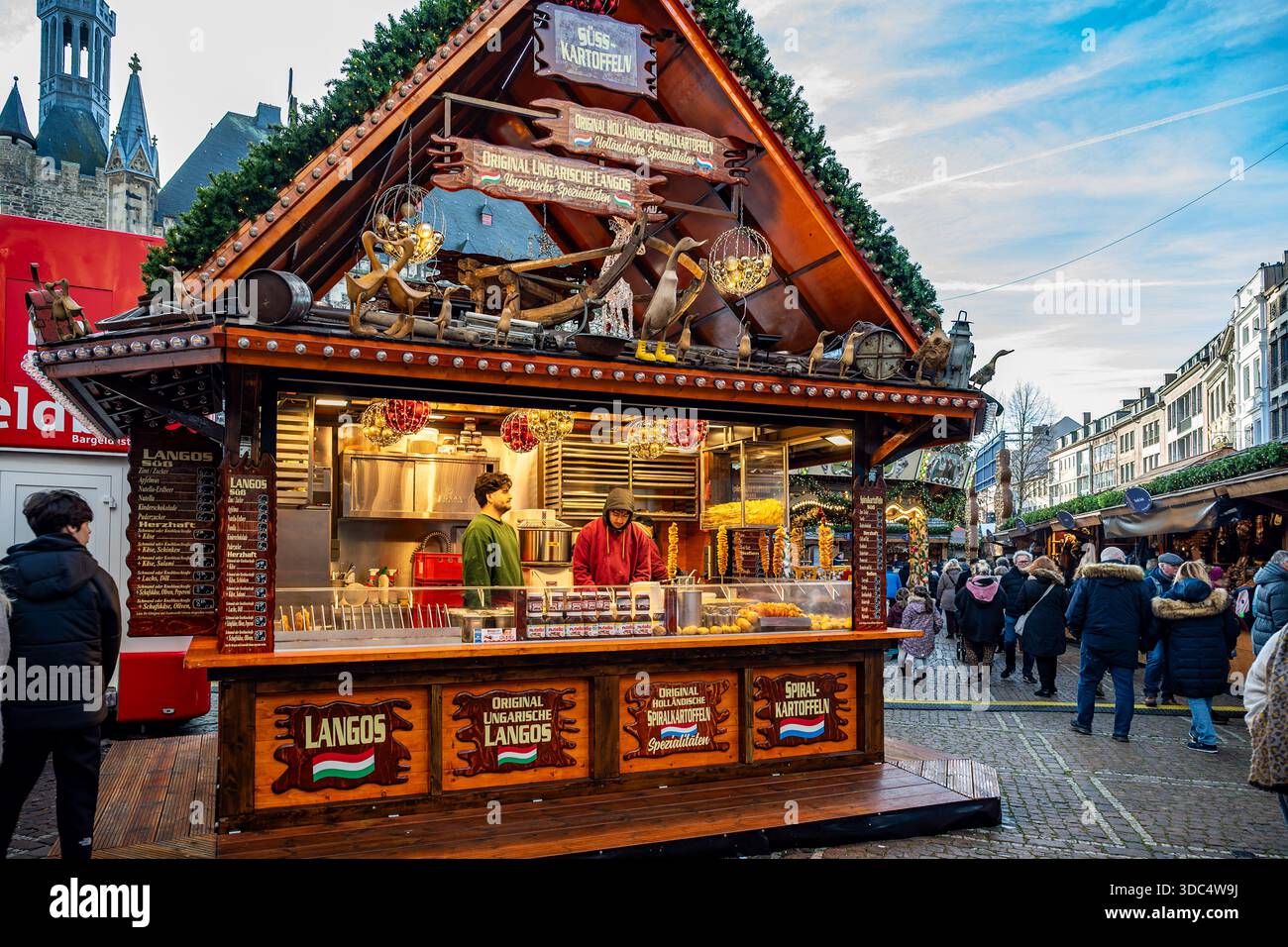 Aachen, Germany - Dec 04, 2025: Wooden street food stall selling langos ...