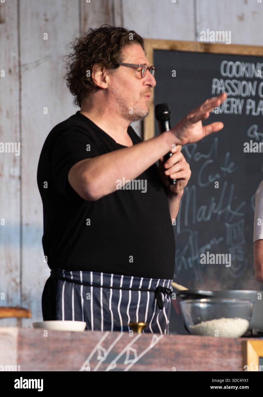 Marco Pierre White cooking in the Neff Big Kitchen at The Big Feastival ...