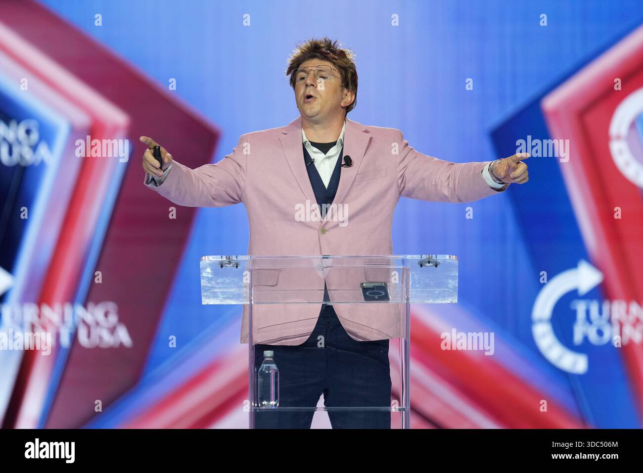 James O'Keefe speaks during Turning Point USA's AmericaFest 2025 ...