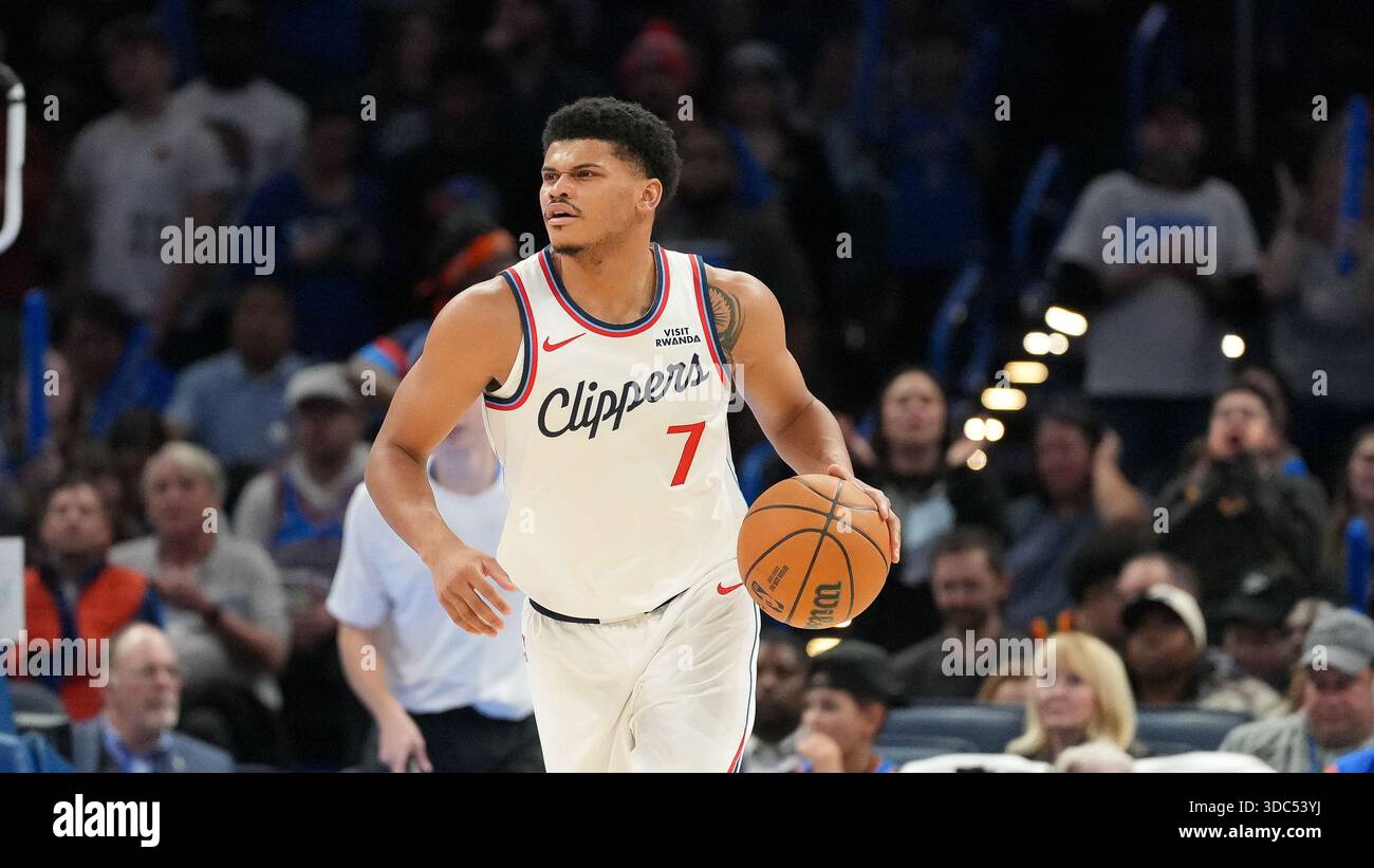 Los Angeles Clippers guard RayJ Dennis pushes down the court during the ...