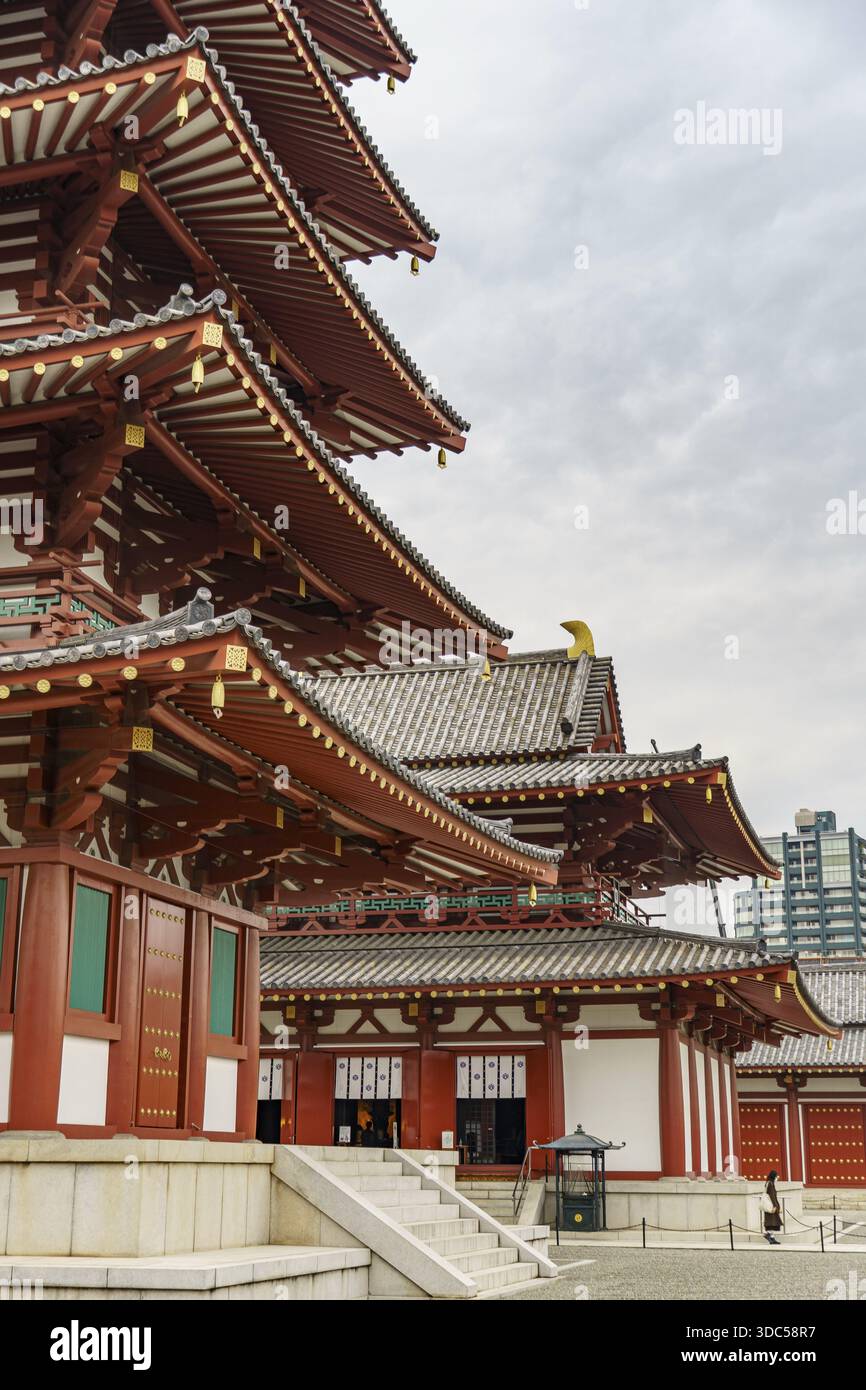 Traditional Japanese temple with red and white wooden structures, Osaka ...