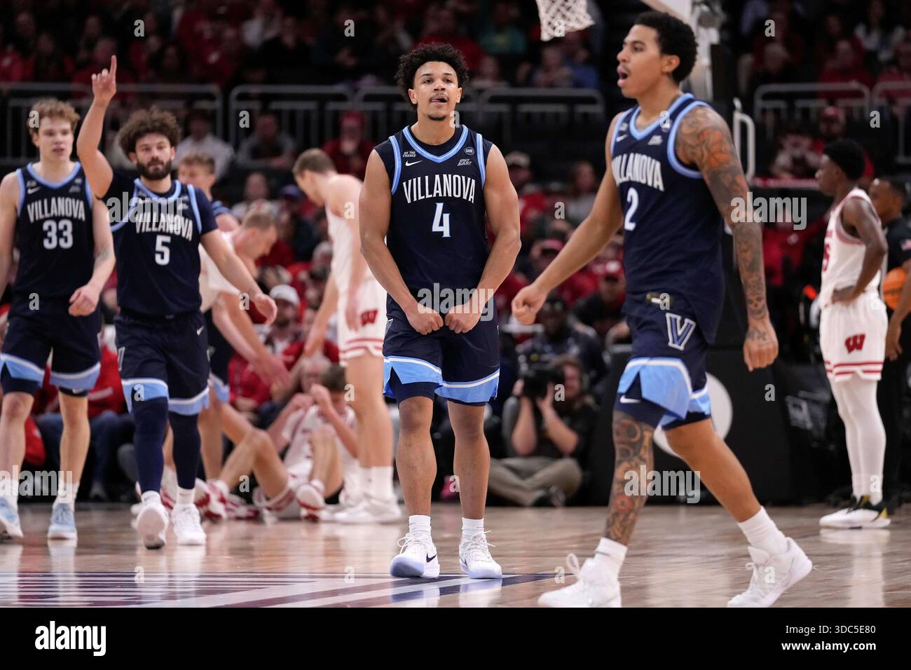 Villanova guard Tyler Perkins (4) reacts to a basket scored by ...
