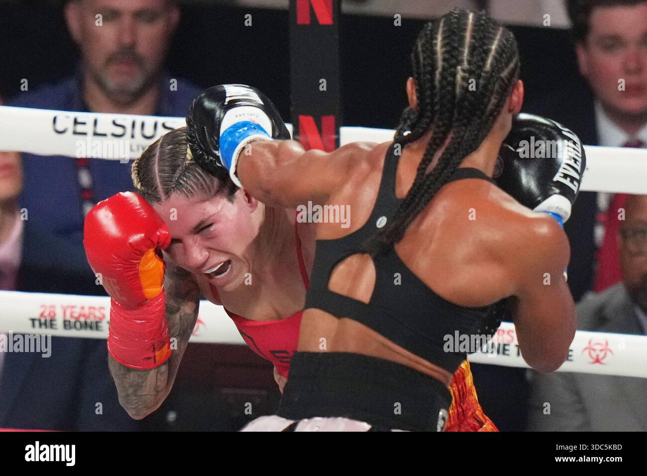 Lela Beaudoin, left, and Alycia Baumgardner, right, compete during ...