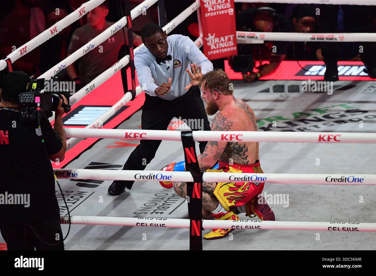 The referee begins to count to 10 after a Jake Paul knockdown during ...