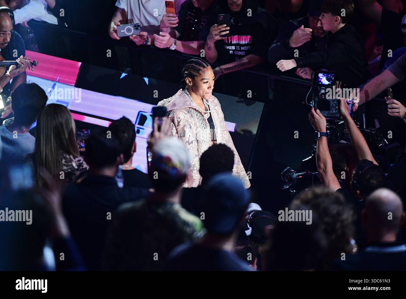 Alycia Baumgardner walks towards the ring prior to her boxing match at ...