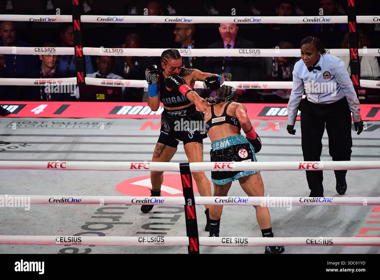 Amanda Galle lands a jab on Cherneka Johnson during their boxing match ...