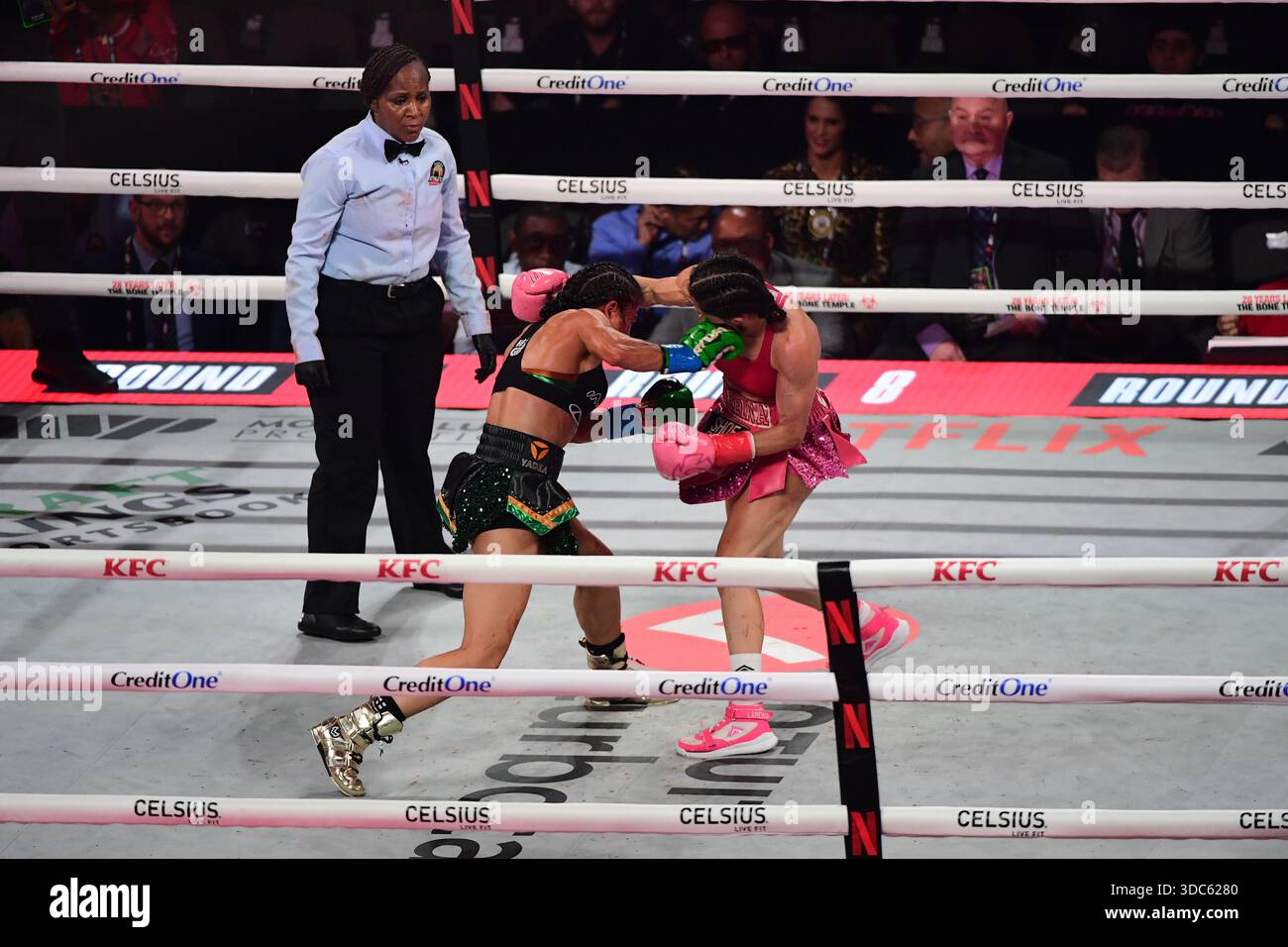 Yokasta Valle and Yadira Bustillos throw punches at each other during ...