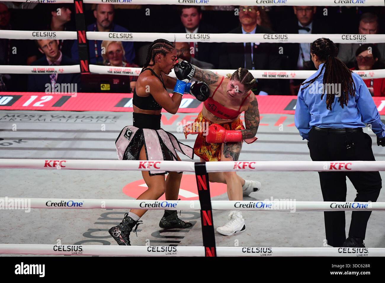 Alycia Baumgardner takes a punch from Leila Beaudoin during their ...