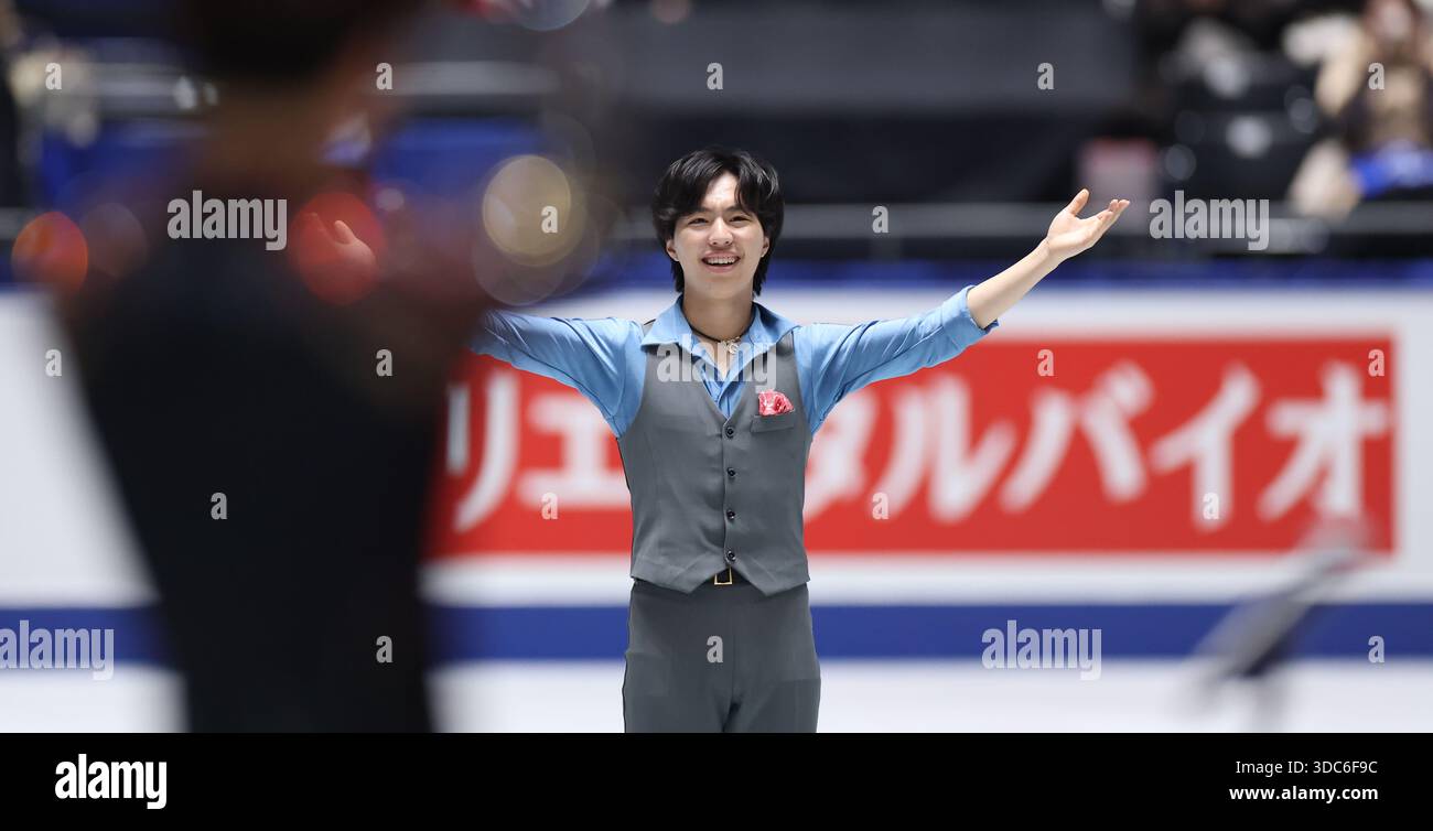 Kao MIURA reacts during an award ceremony for the men's singles at the ...