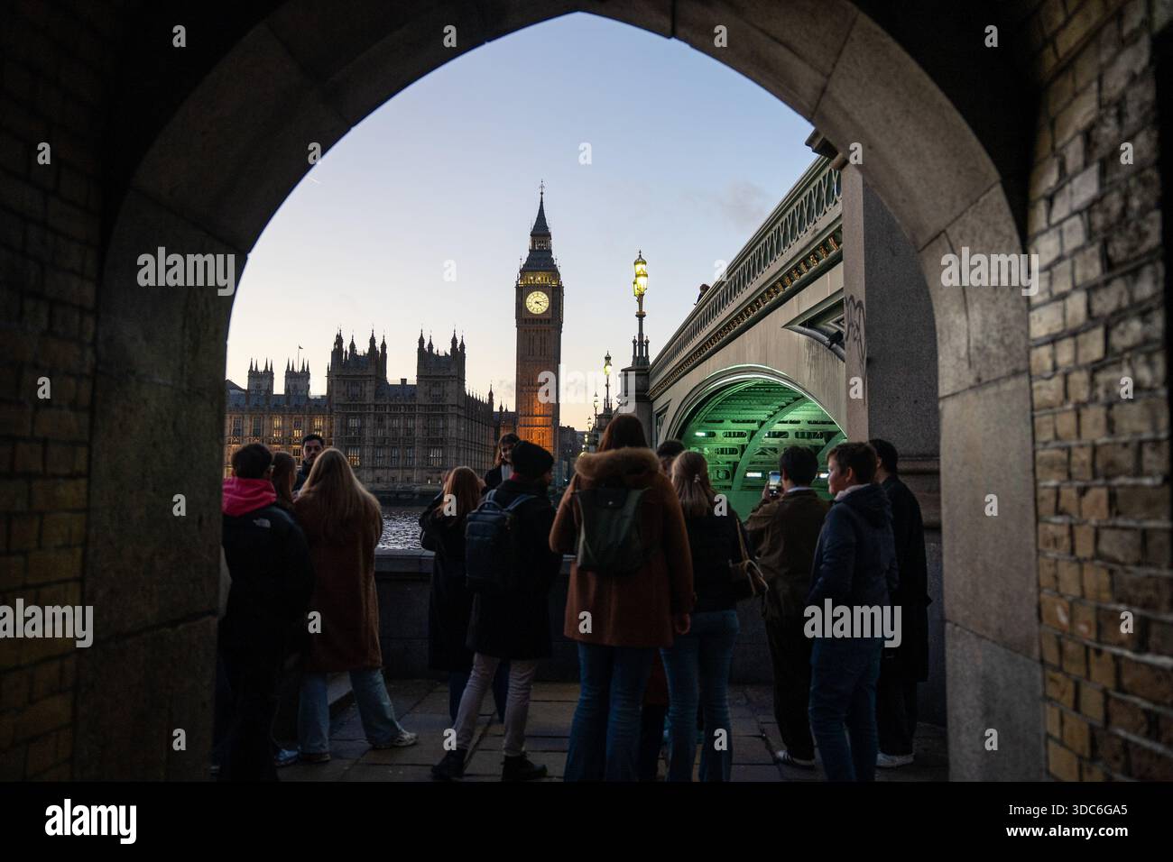 People looking the Elizabeth clock tower commonly called Big Ben and ...