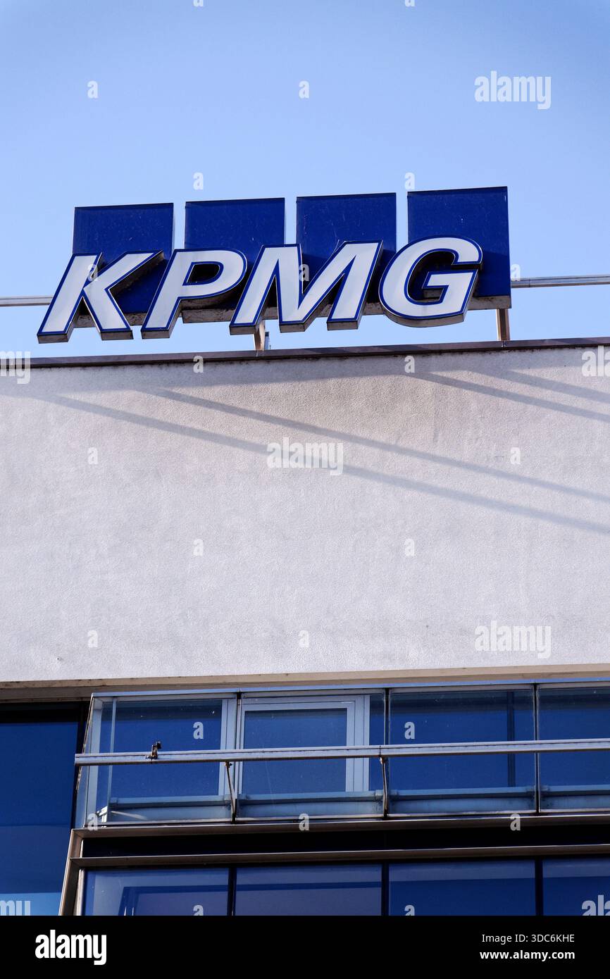 Professional service company KPMG logo on the headquarters building on ...
