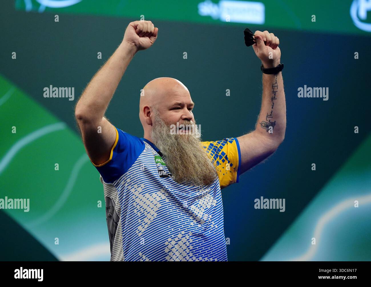 Sweden's Andreas Harrysson celebrates during his match against Japan's ...