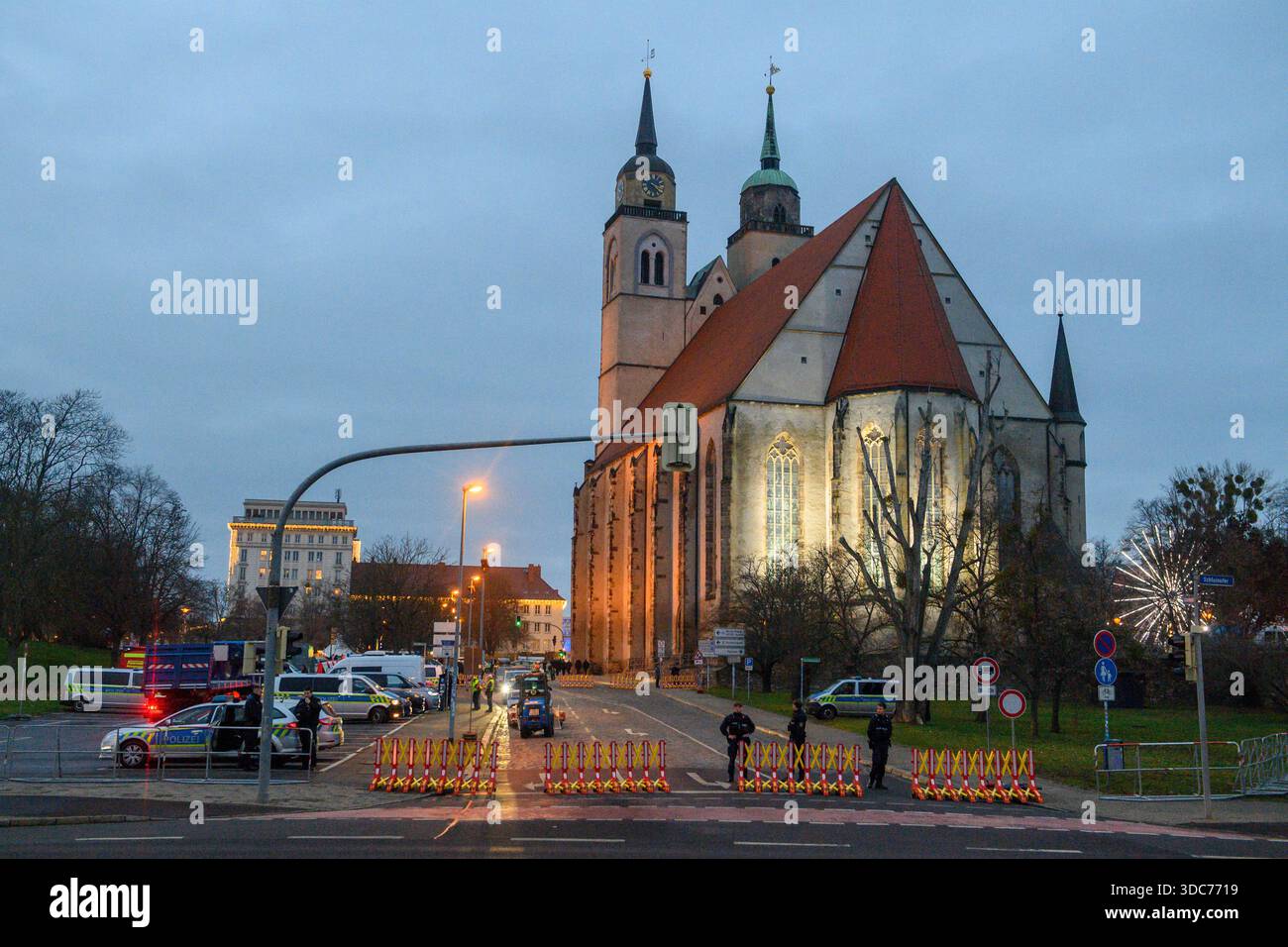 20 December 2025, Saxony-Anhalt, Magdeburg: Police officers block a ...